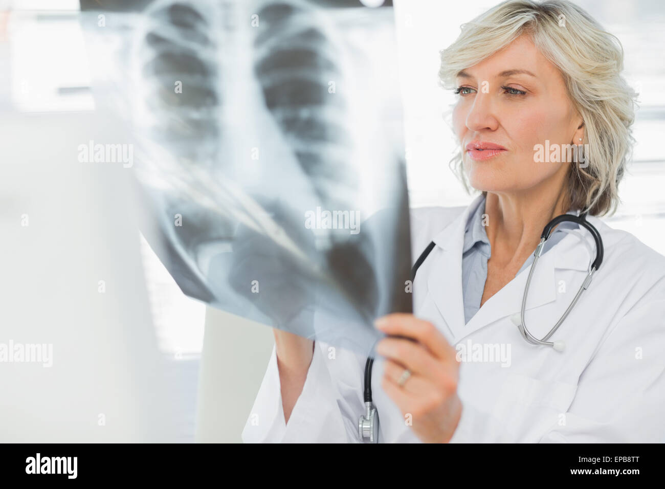 Serious woman doctor short hair hi-res stock photography and images - Alamy