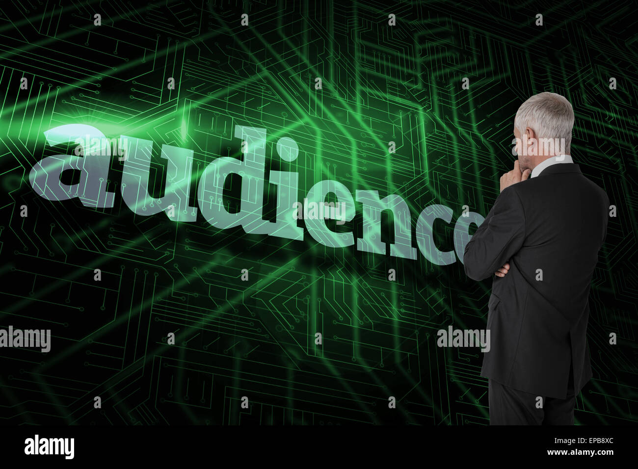 Audience against green and black circuit board Stock Photo - Alamy