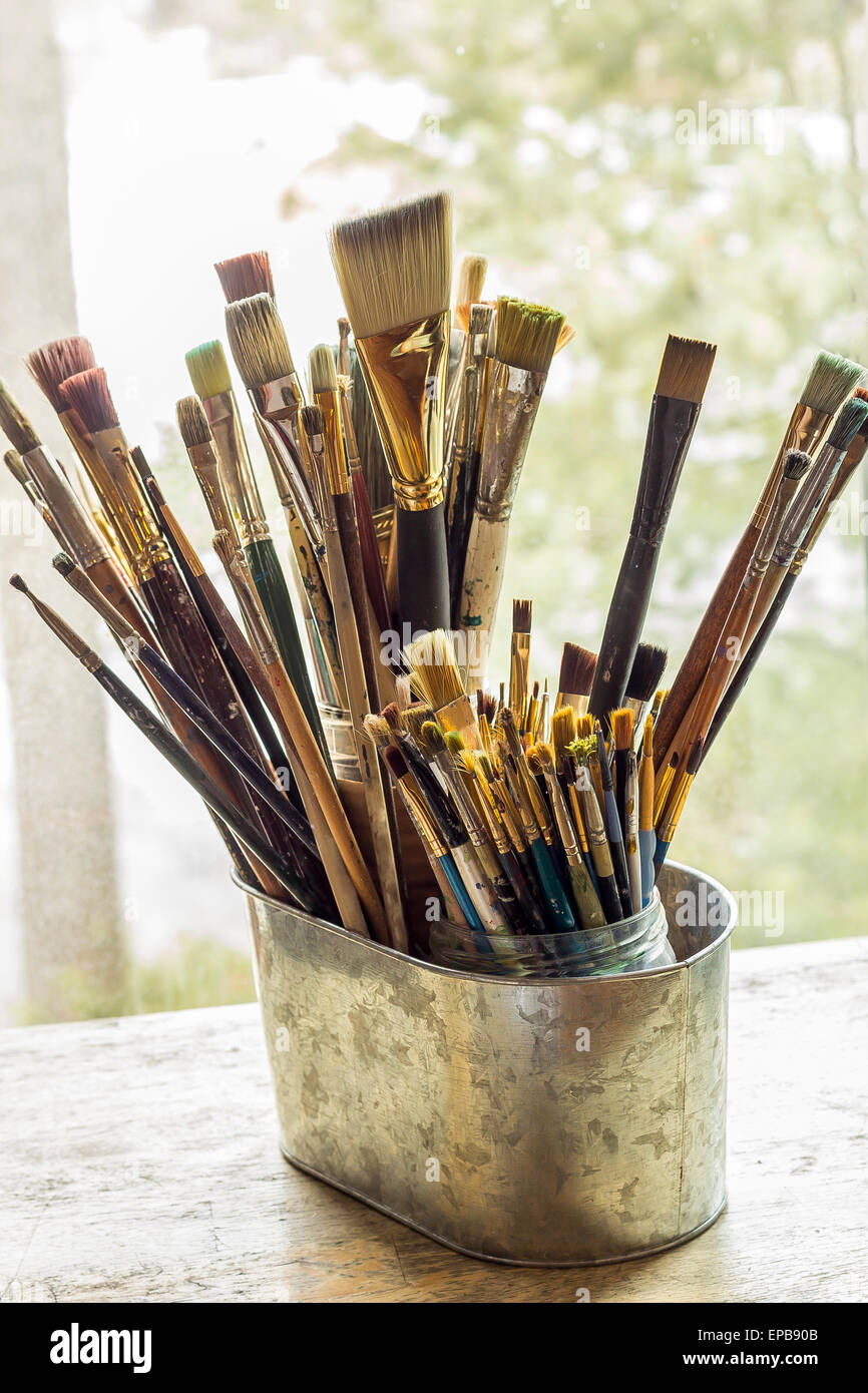 Container kit of assorted and stained old artist paintbrushes Stock ...