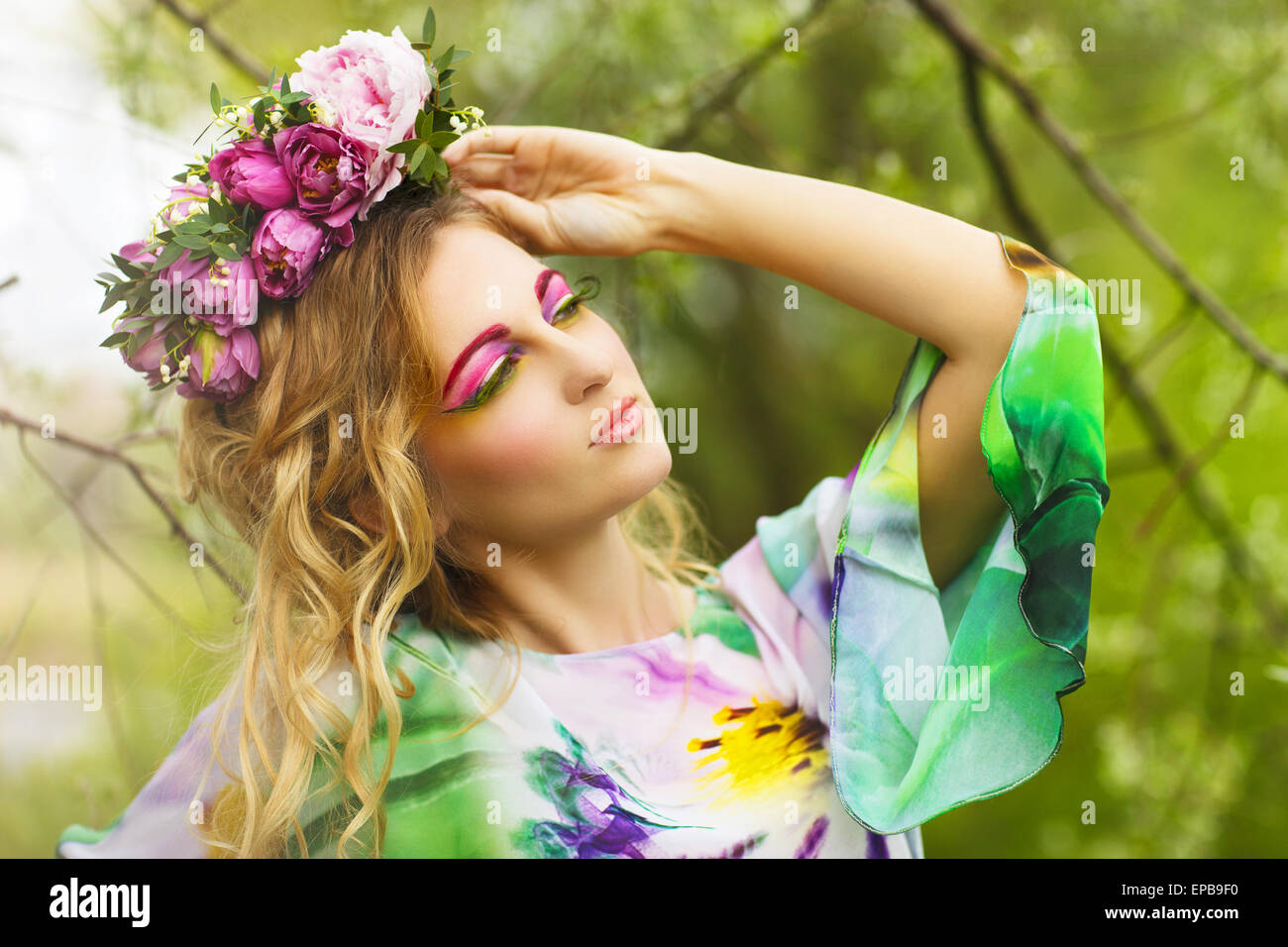Portrait of a young woman with flower crown Stock Photo - Alamy