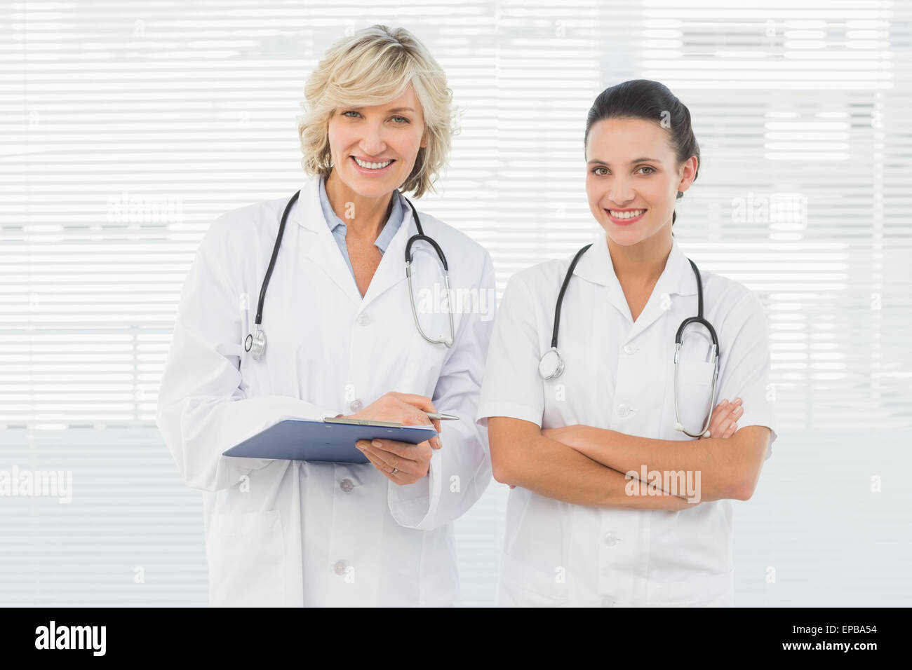 Portrait of two confident female doctors Stock Photo - Alamy