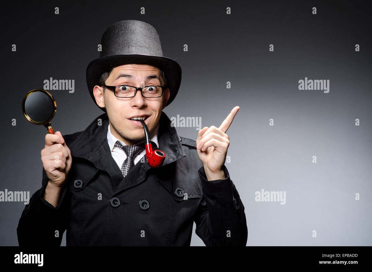 Funny detective with pipe and hat Stock Photo - Alamy