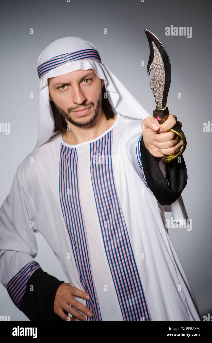 Arab man with sharp knife Stock Photo - Alamy