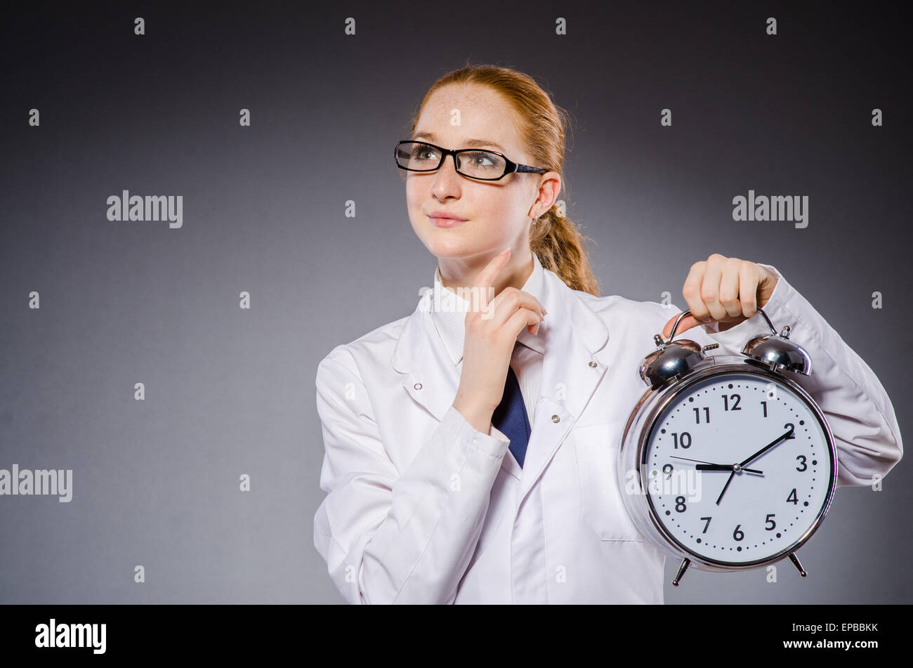 Woman doctor missing her deadlines Stock Photo - Alamy