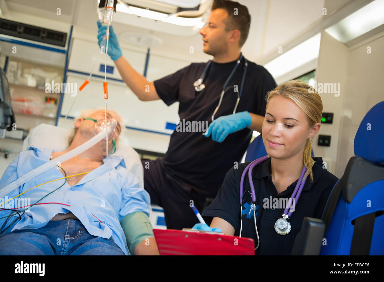 Patient lying in ambulance hi-res stock photography and images - Alamy