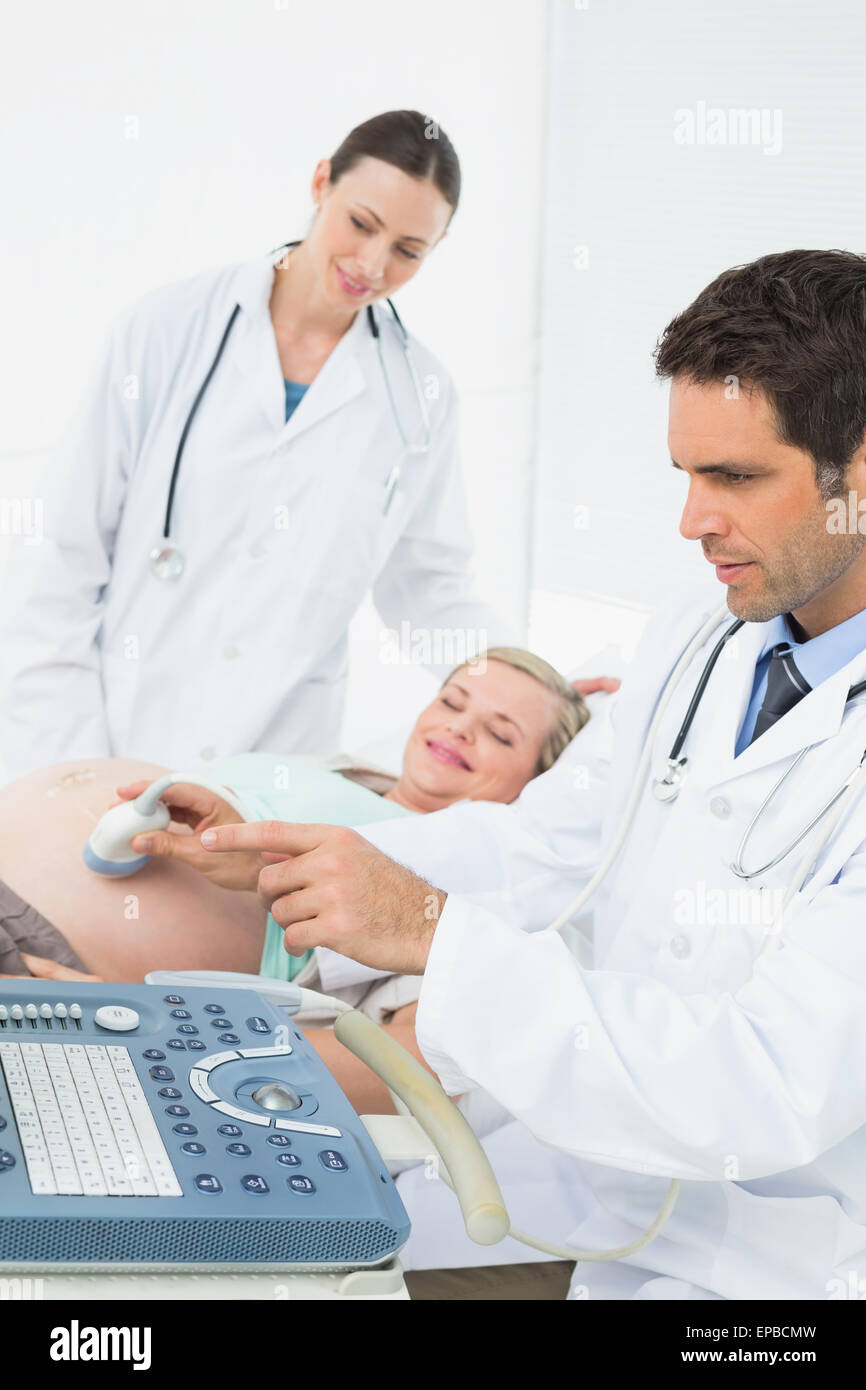 Medical team obstetrician examining hi-res stock photography and images ...