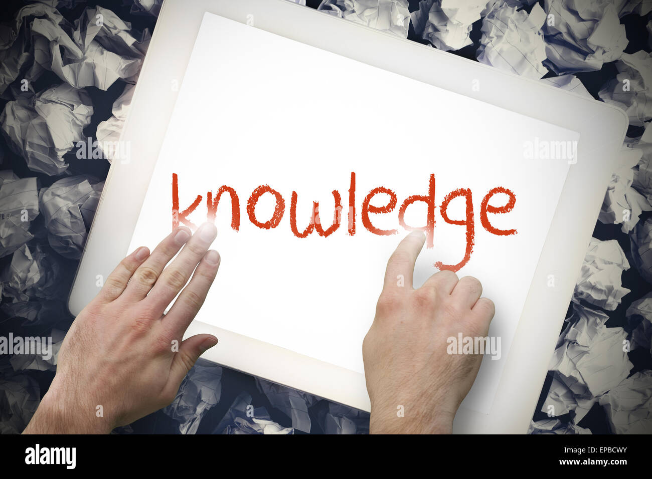 Hand touching knowledge on search bar on tablet screen Stock Photo - Alamy
