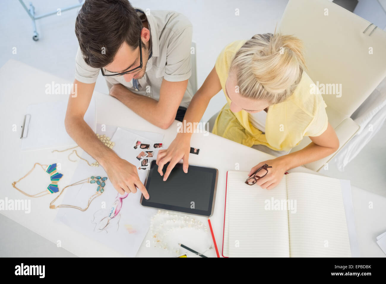 Fashion designers using digital laptop Stock Photo - Alamy