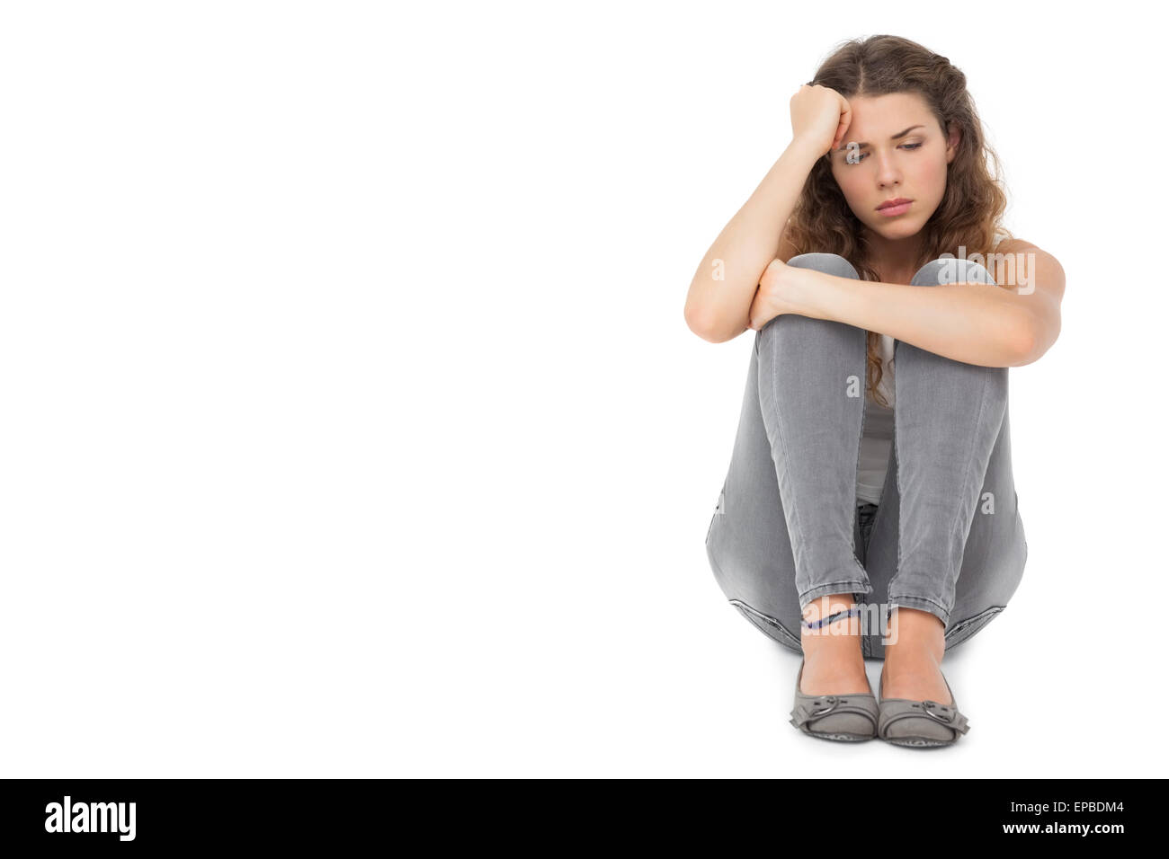 Full length of a sad young woman Stock Photo - Alamy