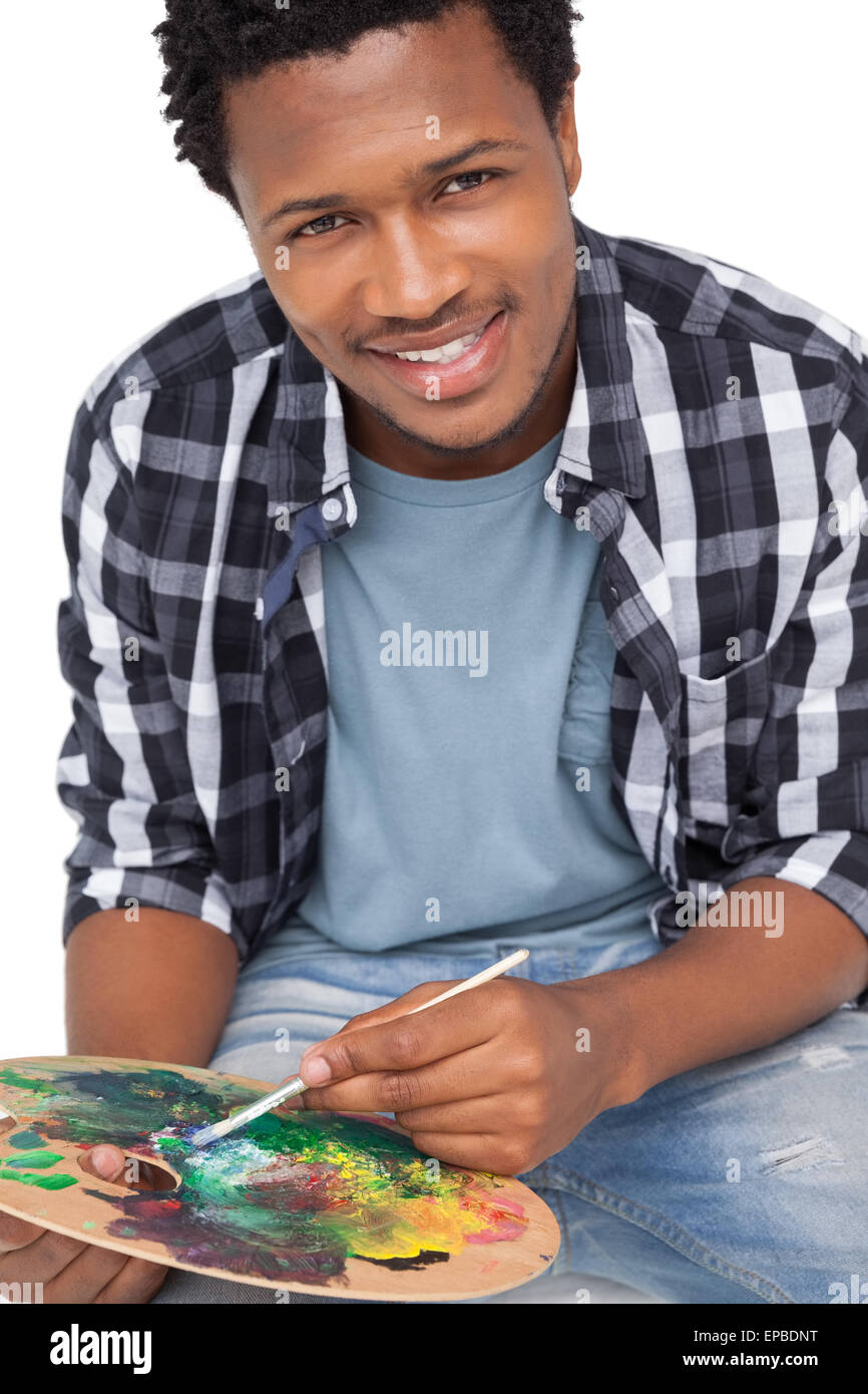 Portrait of a young male painter with palette Stock Photo - Alamy