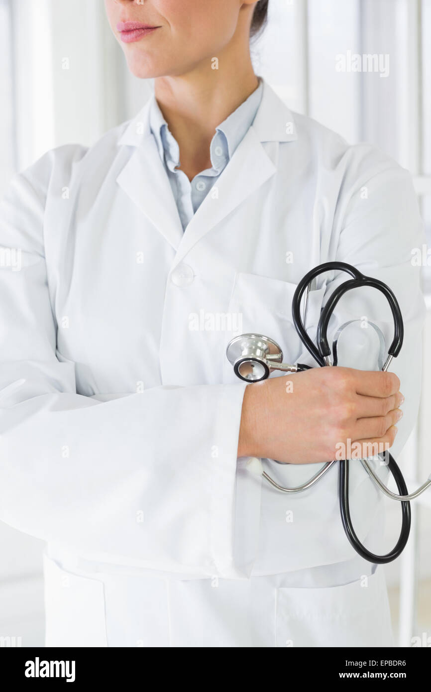 Mid section of a female doctor with stethoscope in hospital Stock Photo ...