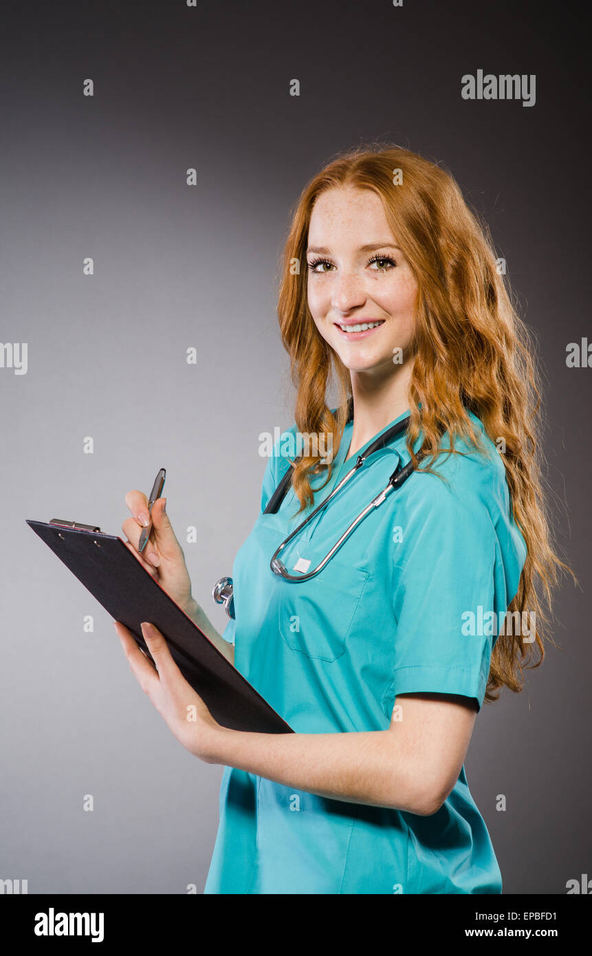 Woman doctor with paper notepad Stock Photo - Alamy
