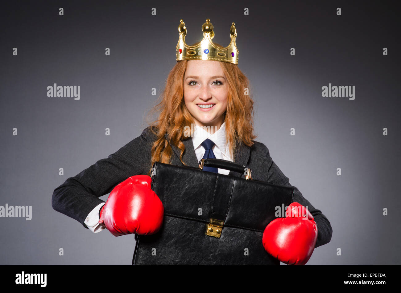 Woman boxer with crown and red gloves Stock Photo - Alamy