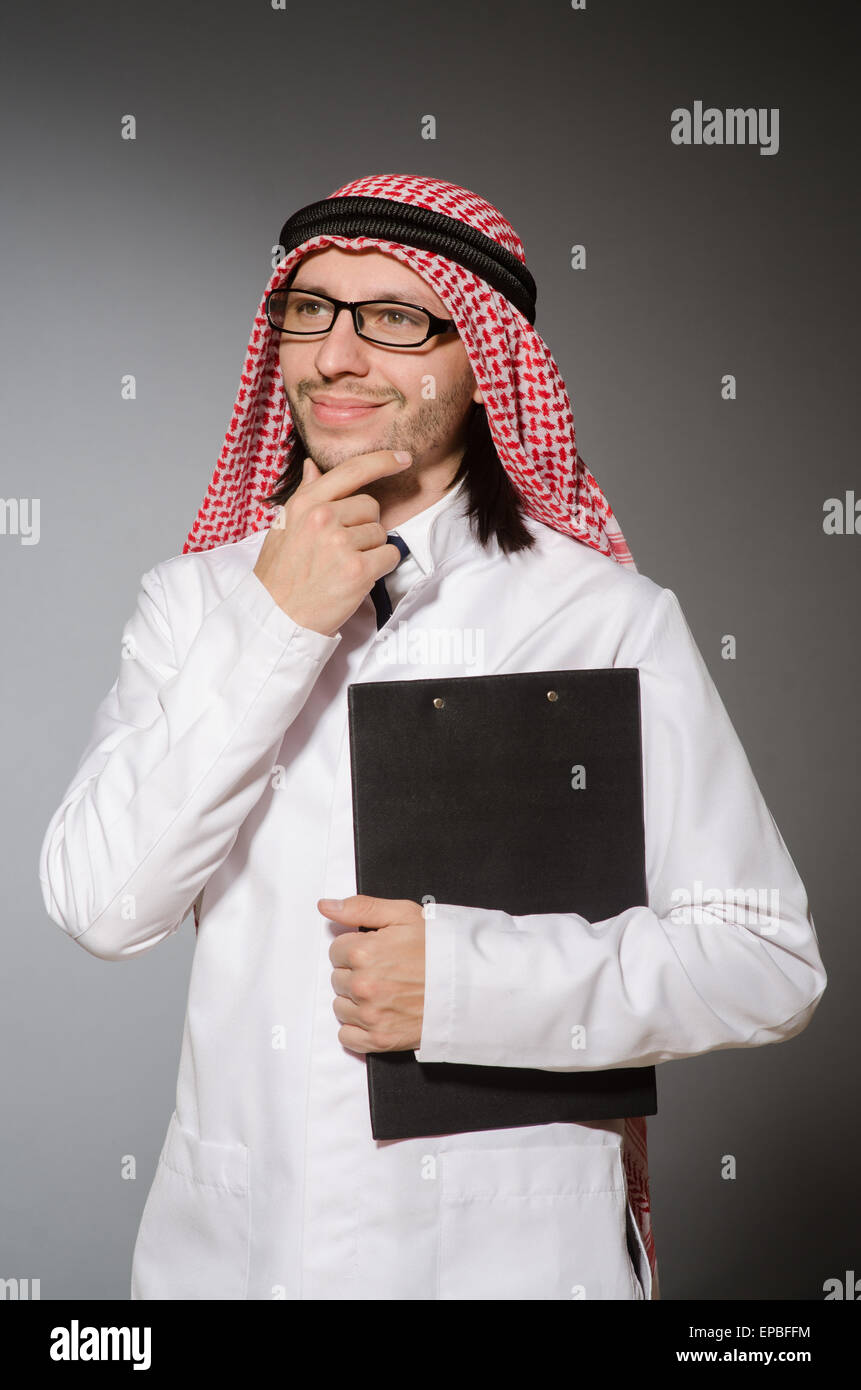 Arab man with paper binder Stock Photo - Alamy
