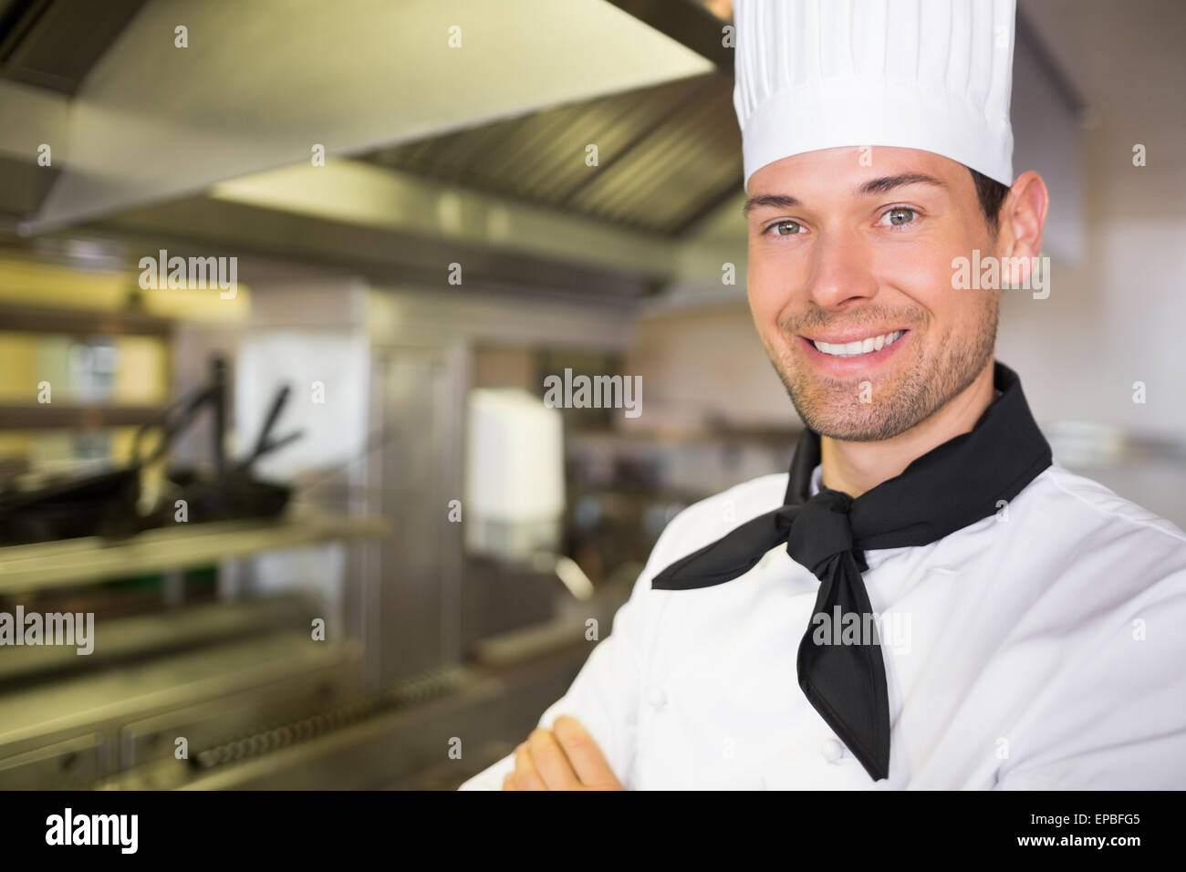 Smiling male cook in the kitchen Stock Photo - Alamy