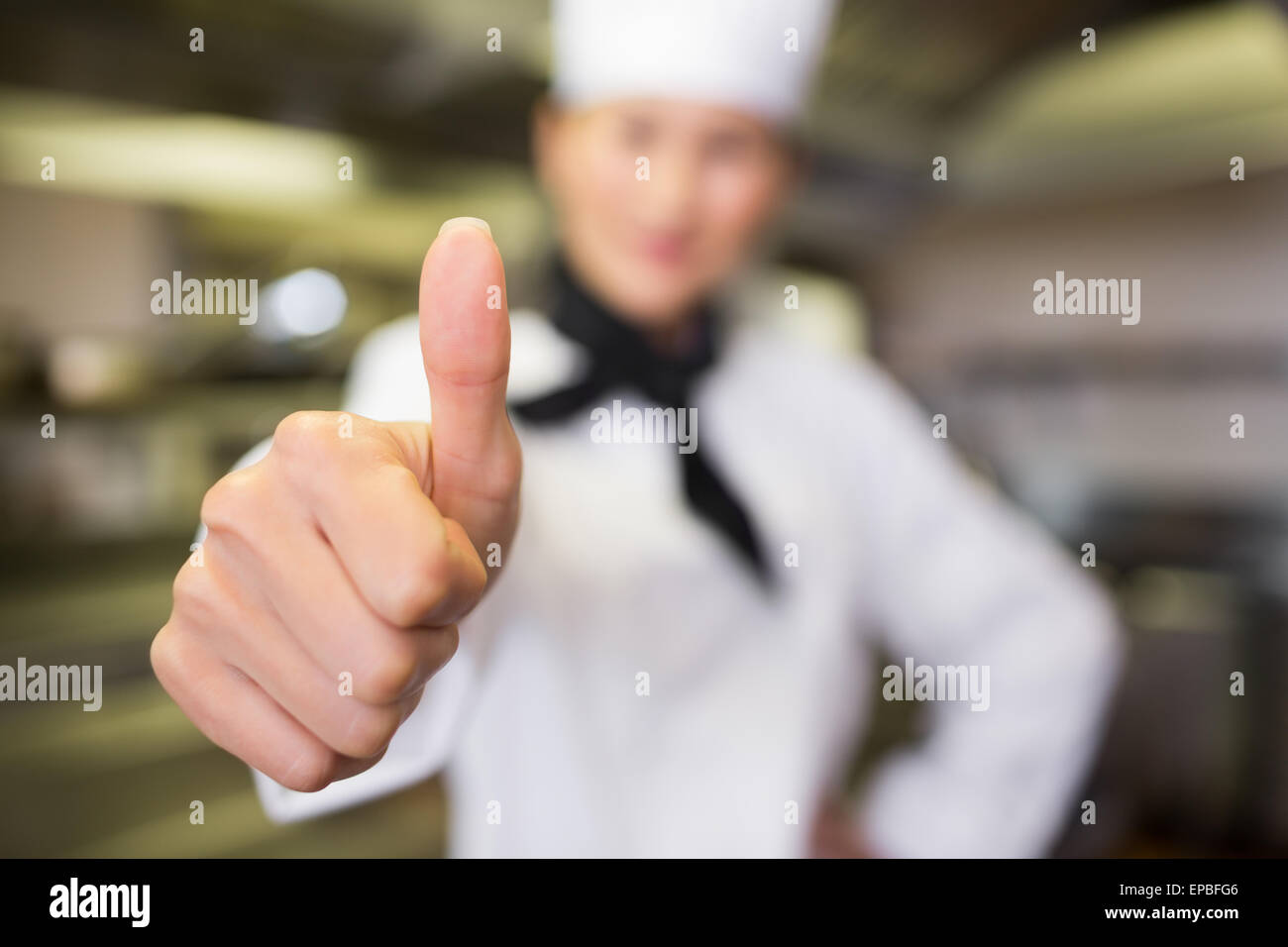 Positive female young cook hi-res stock photography and images - Alamy