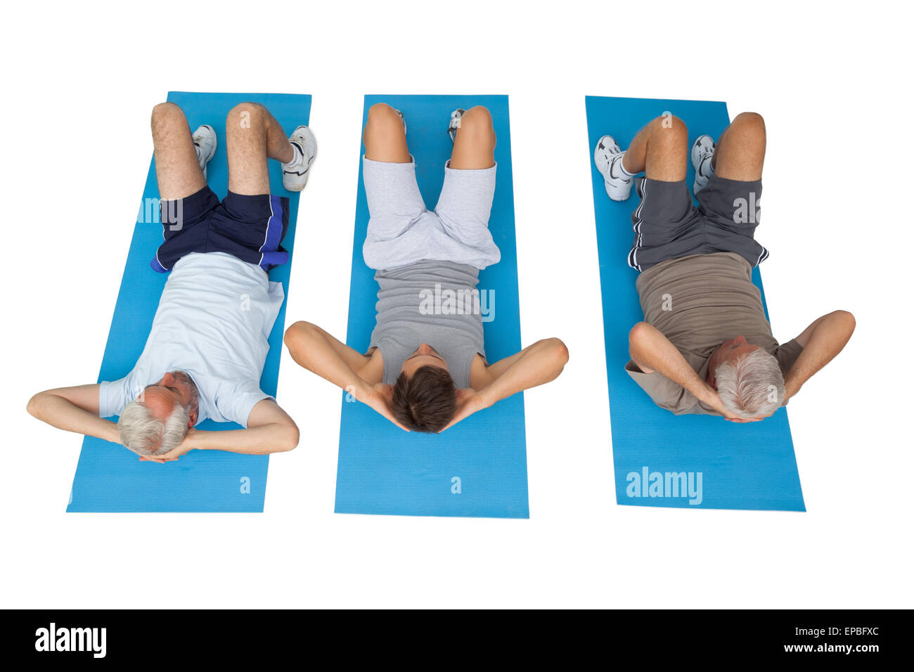 Full length of three men doing abdominal crunches Stock Photo - Alamy