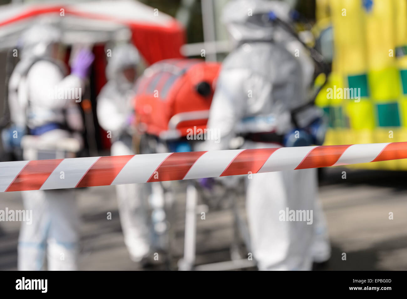 Closeup of crossing barrier tape biohazard team Stock Photo - Alamy