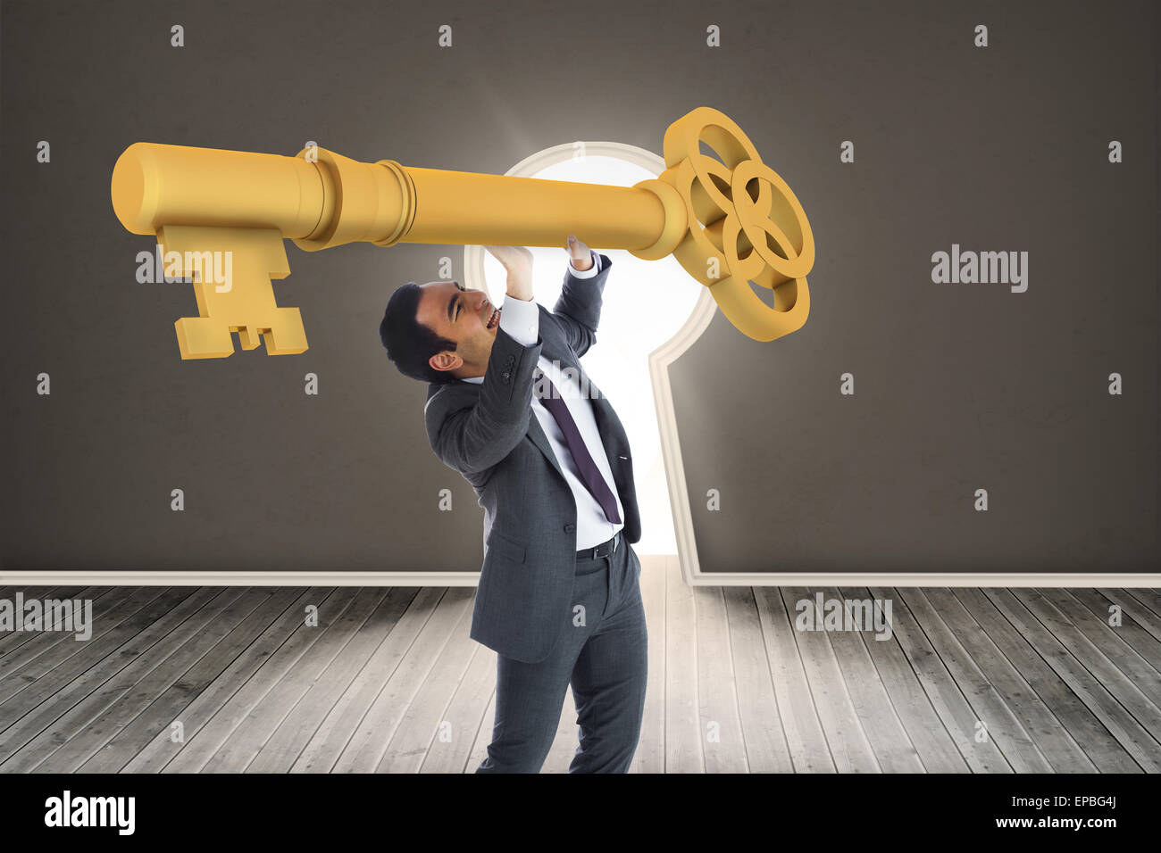 Composite image of stressed businessman carrying large key Stock Photo ...