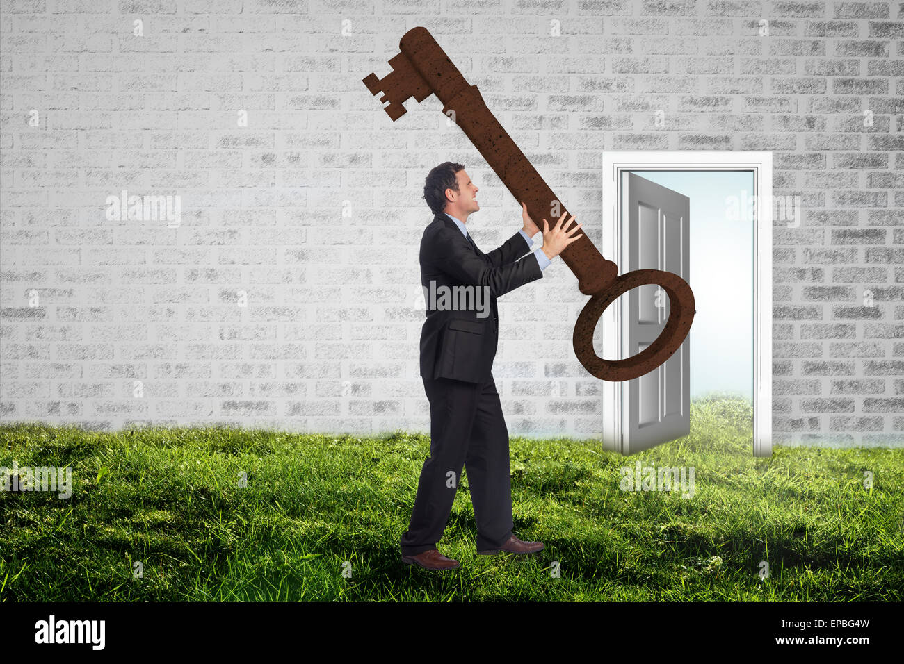 Composite image of stressed businessman carrying large key Stock Photo ...