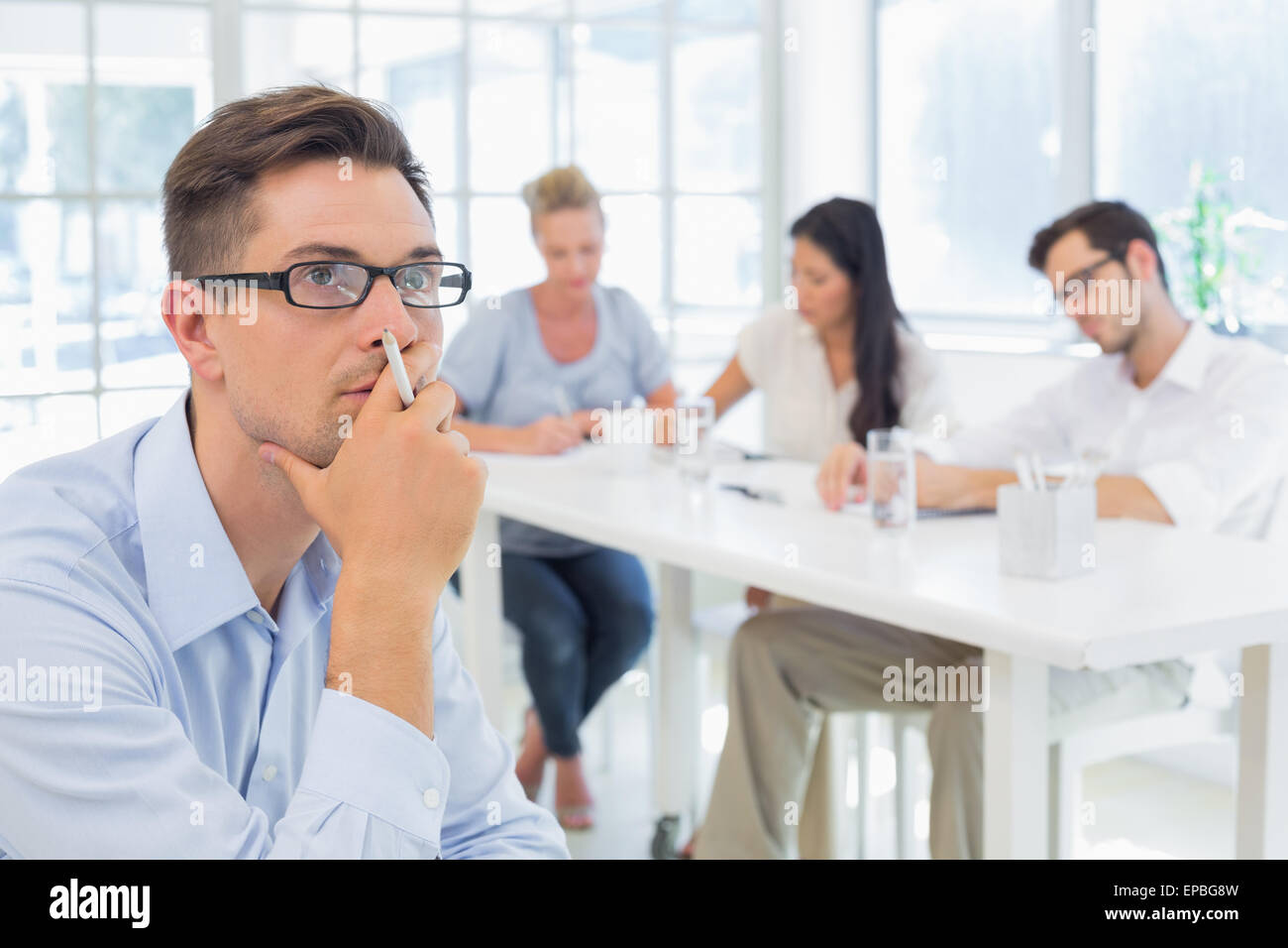 Focused businessman concentrating thinking working hi-res stock ...