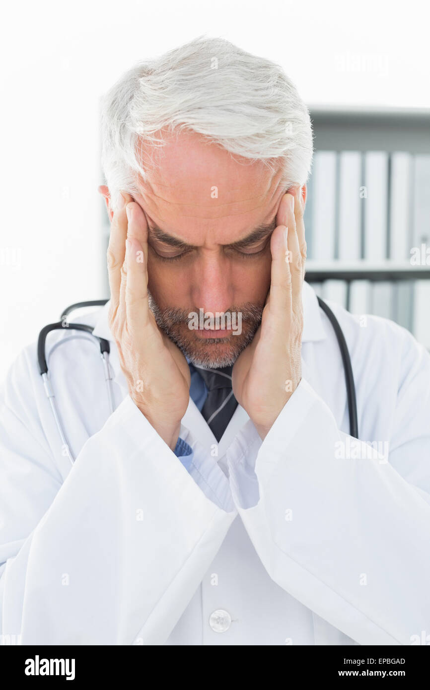 Close up doctor headache working hi-res stock photography and images ...
