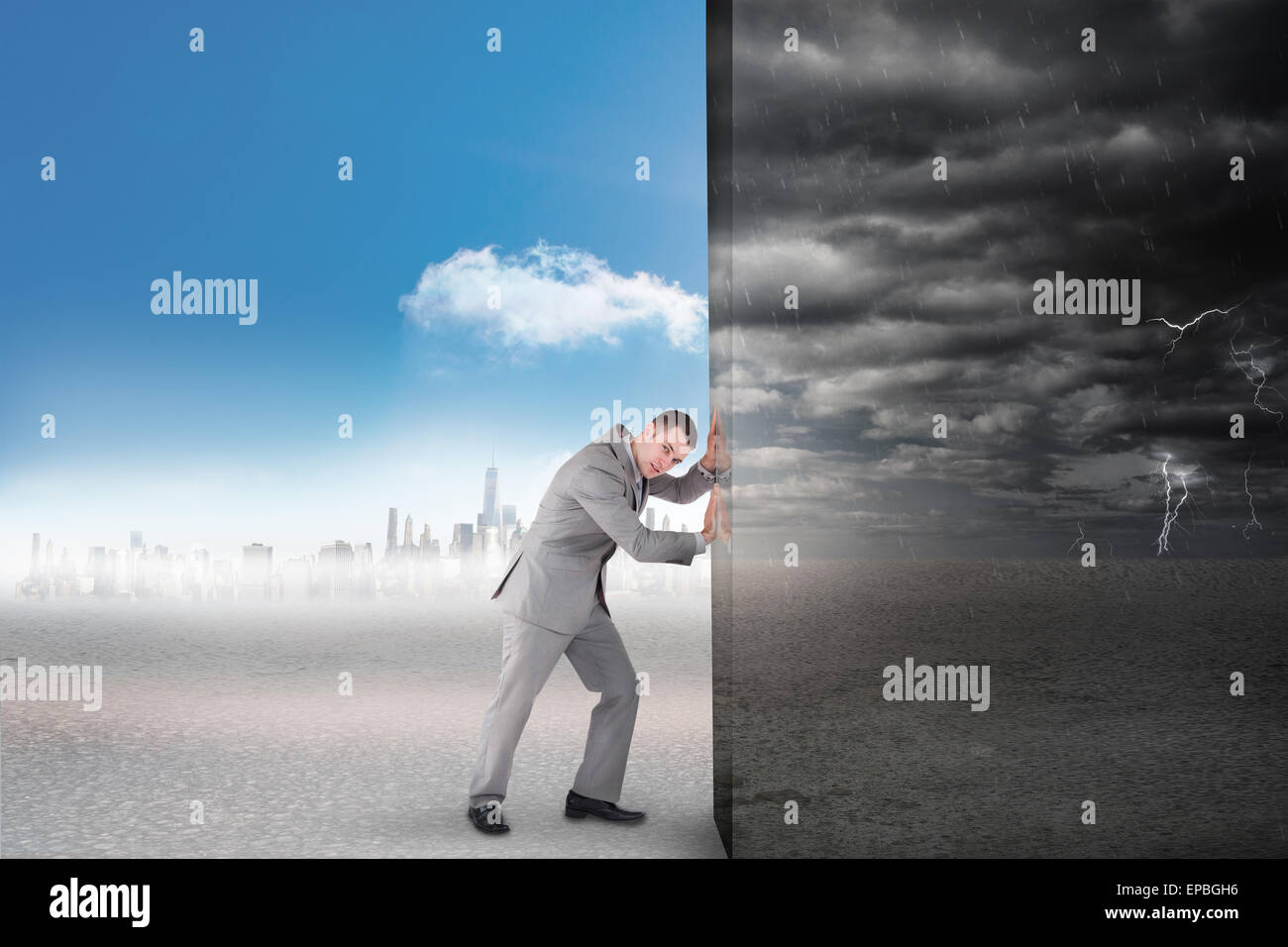 Composite image of businessman pushing away scene Stock Photo - Alamy