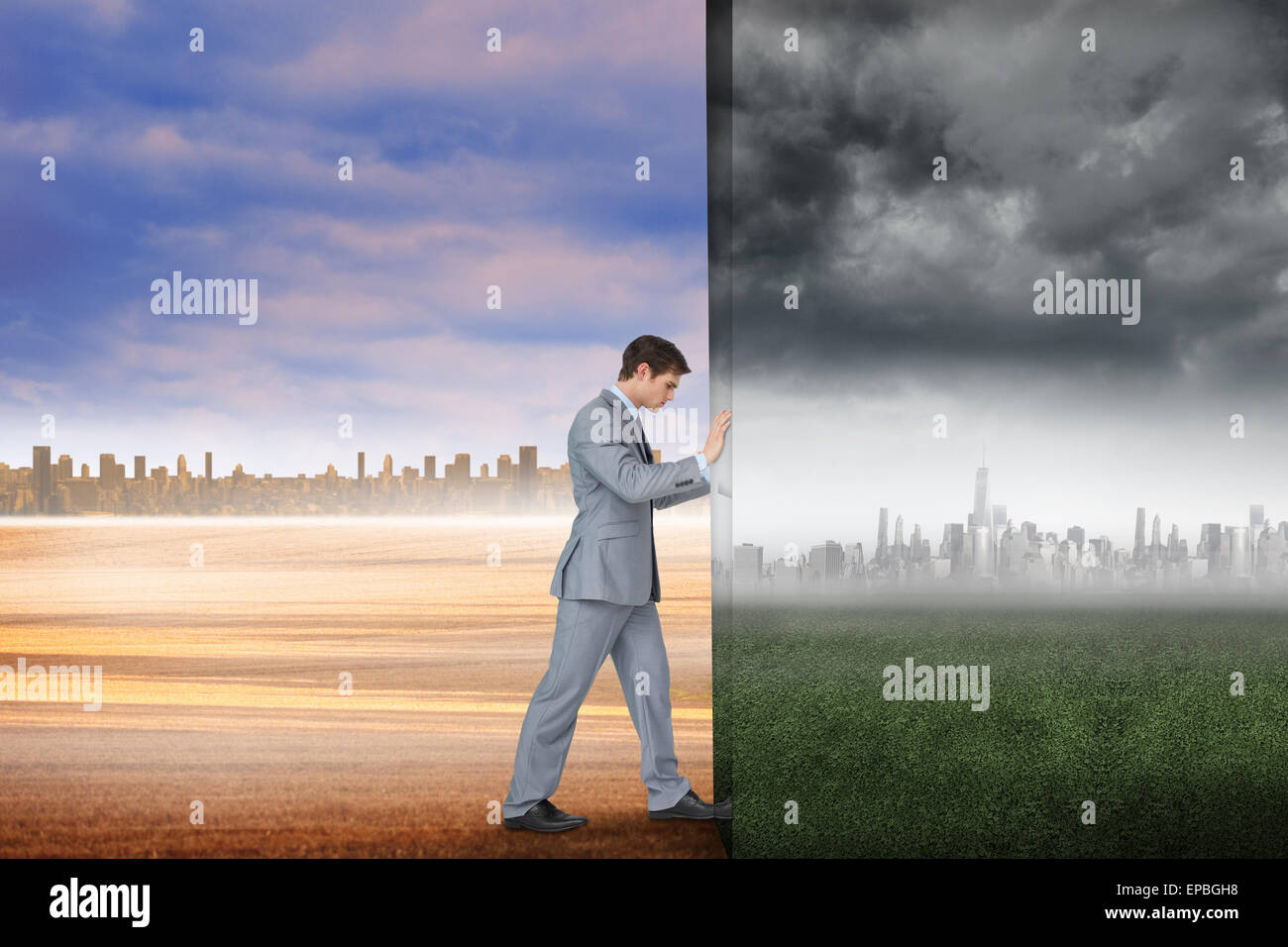 Composite image of businessman pushing away scene Stock Photo - Alamy
