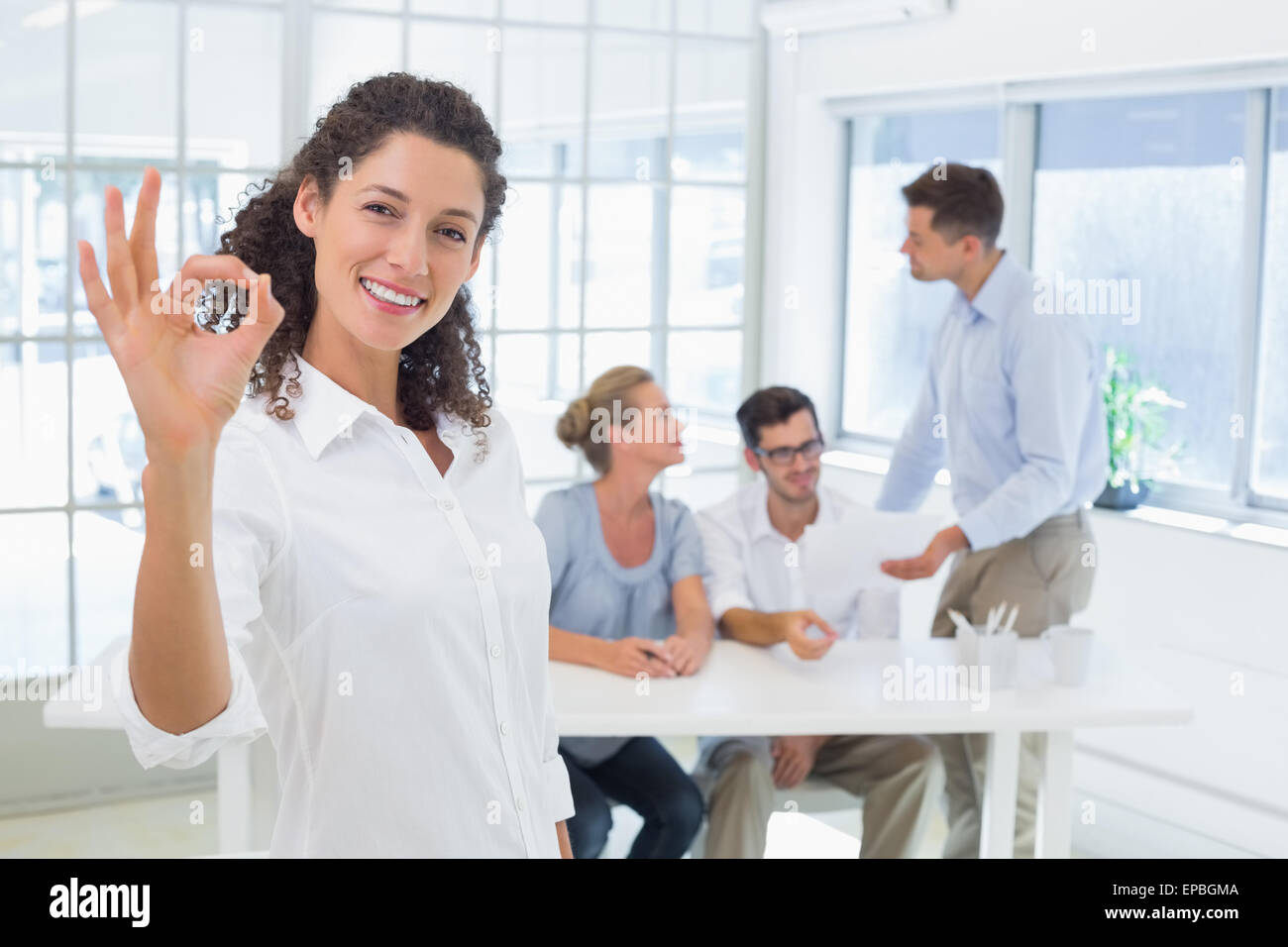 Businesswoman making ‘ok sign hi-res stock photography and images - Alamy