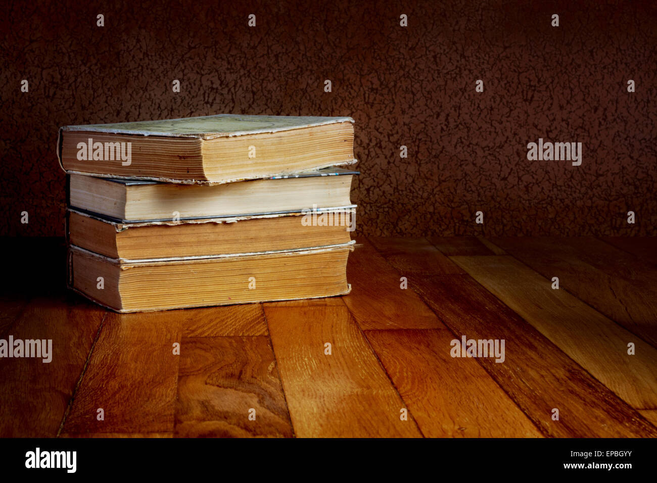 Pile of old books on a beautiful wooden table Stock Photo - Alamy