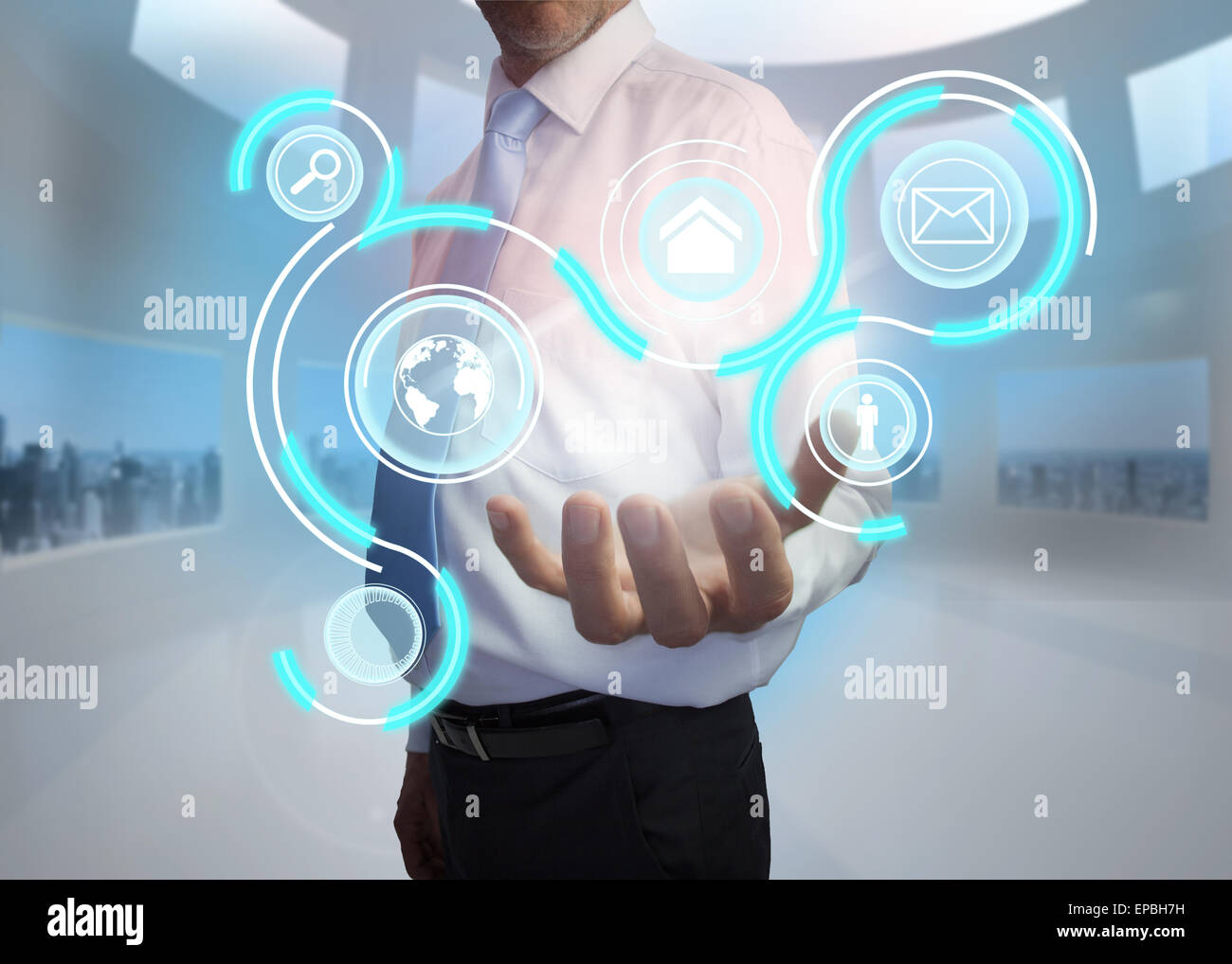 Businessman presenting interface with email and earth options Stock ...