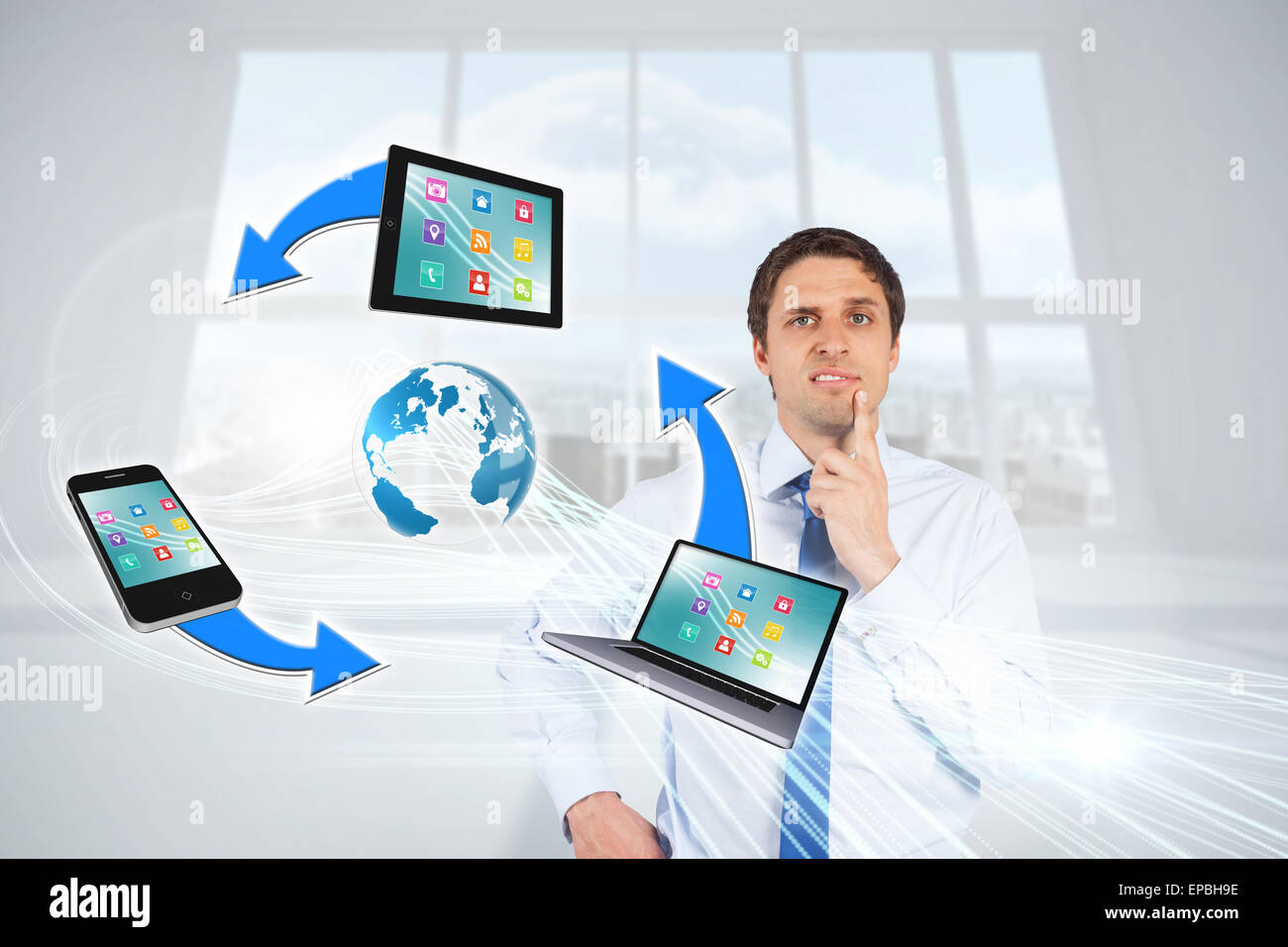 Confused businessman with computer connection graphic Stock Photo - Alamy