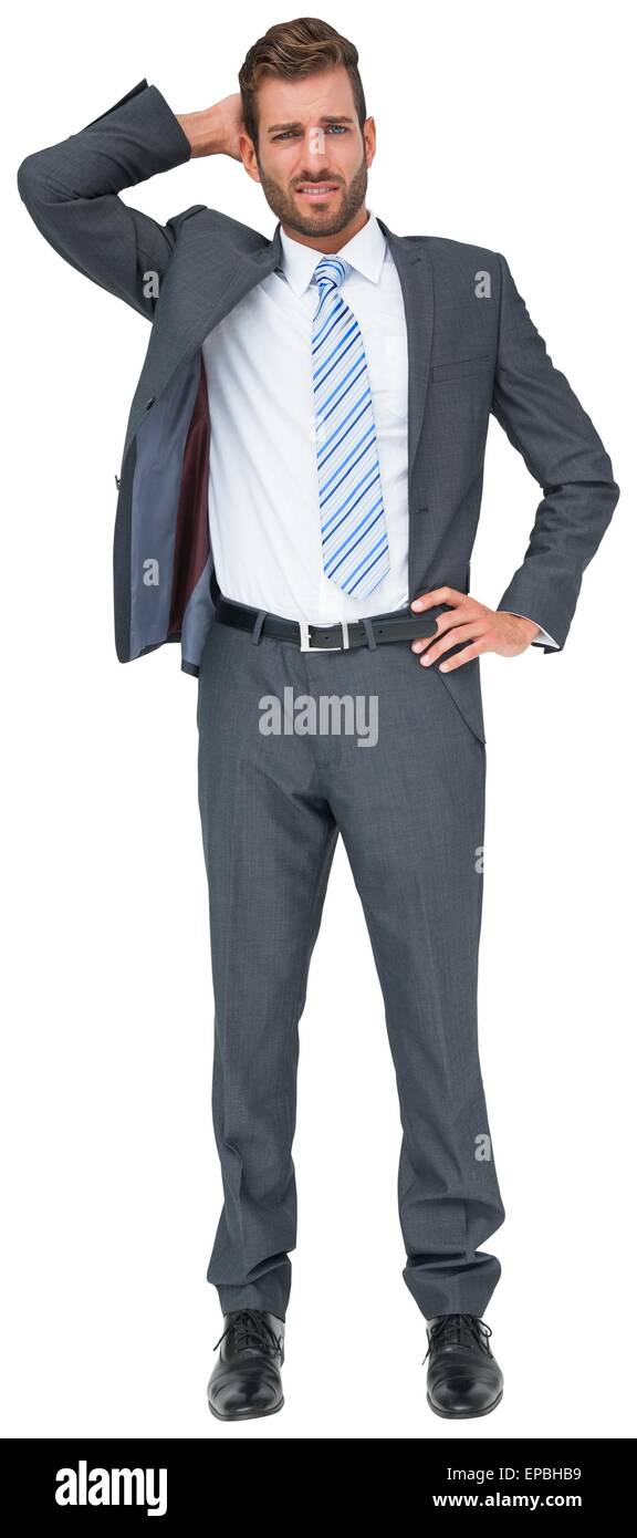Thinking businessman with hand on head Stock Photo - Alamy