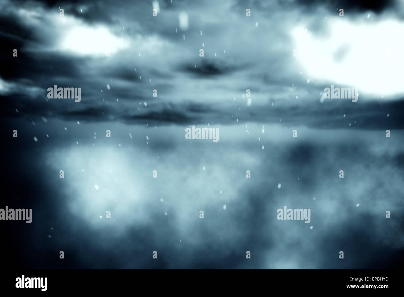 Cloudy sky with snow falling Stock Photo - Alamy