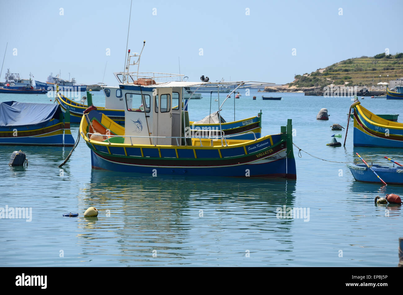 Traditional Maltese luzzu in Marsaxlokk harbour Stock Photo - Alamy