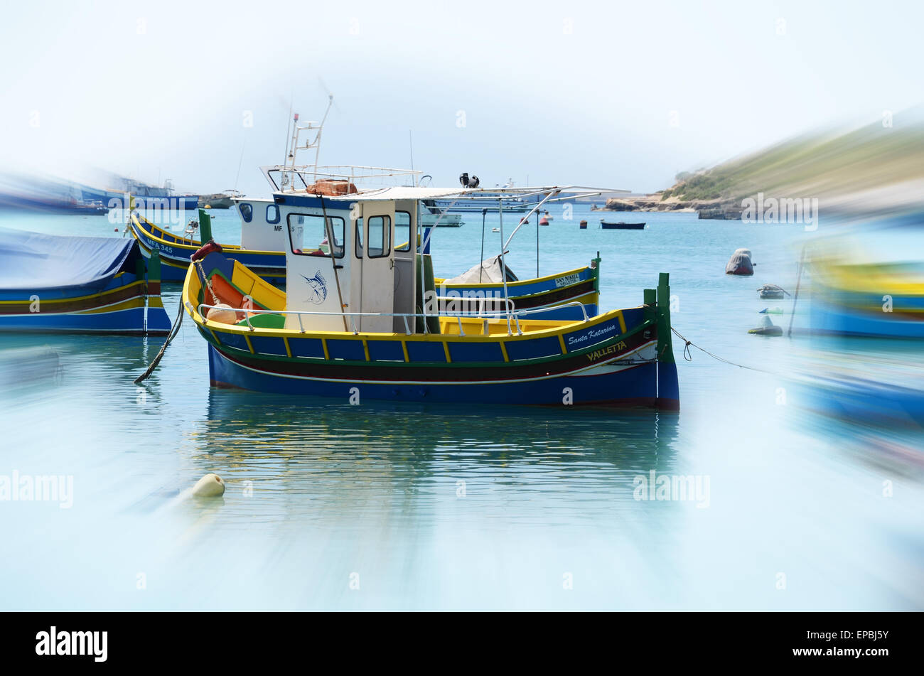Traditional Maltese luzzu in Marsaxlokk harbour Stock Photo - Alamy