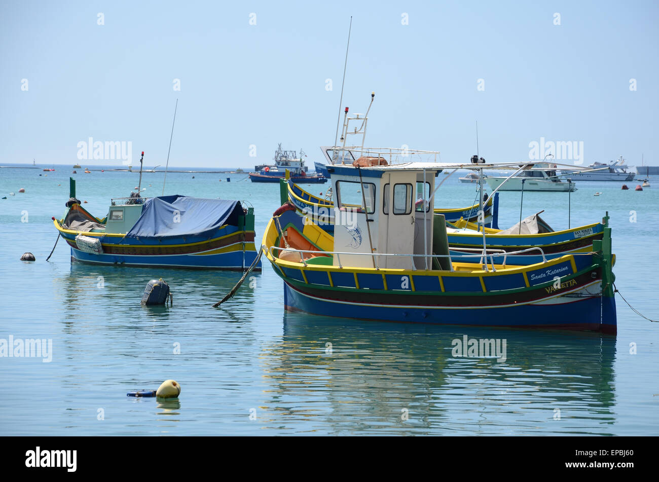 Traditional Maltese luzzu in Marsaxlokk harbour Stock Photo - Alamy