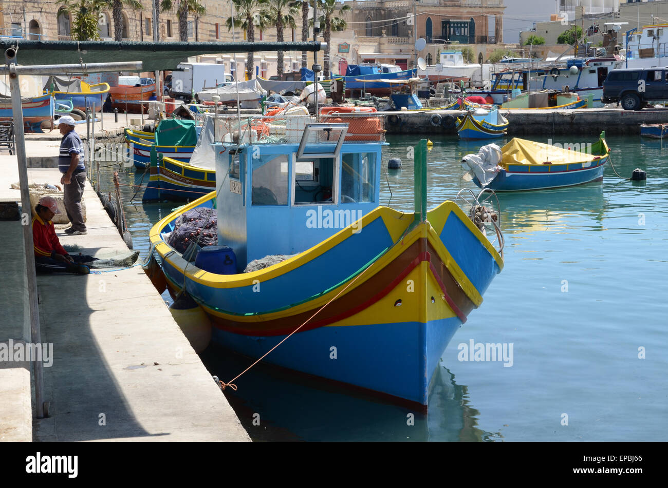 Traditional Maltese luzzu in Marsaxlokk harbour Stock Photo - Alamy