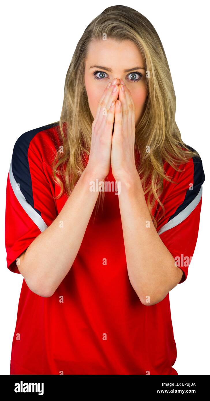 Nervous football fan in red Stock Photo - Alamy
