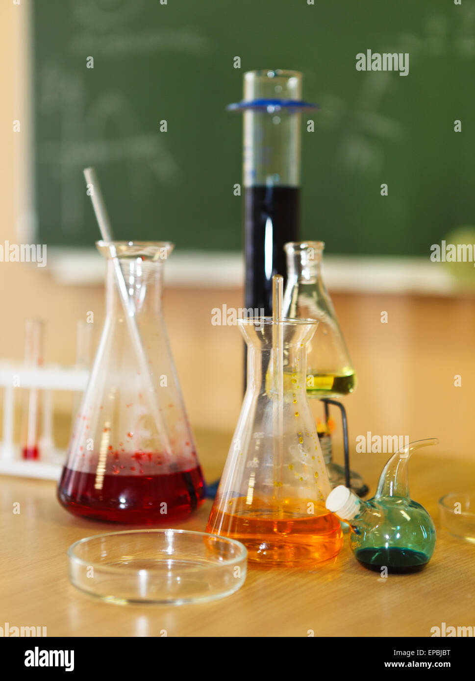 Chemistry laboratory glassware with liquid formula Stock Photo - Alamy