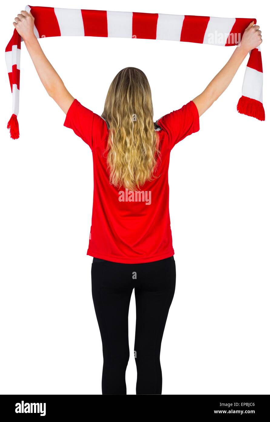Cheering football fan in red on white background Stock Photo - Alamy