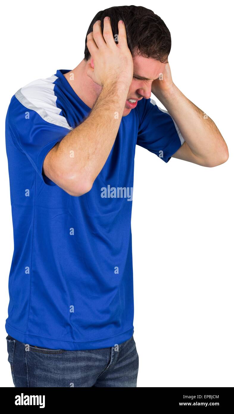 Disappointed football fan in blue Stock Photo - Alamy
