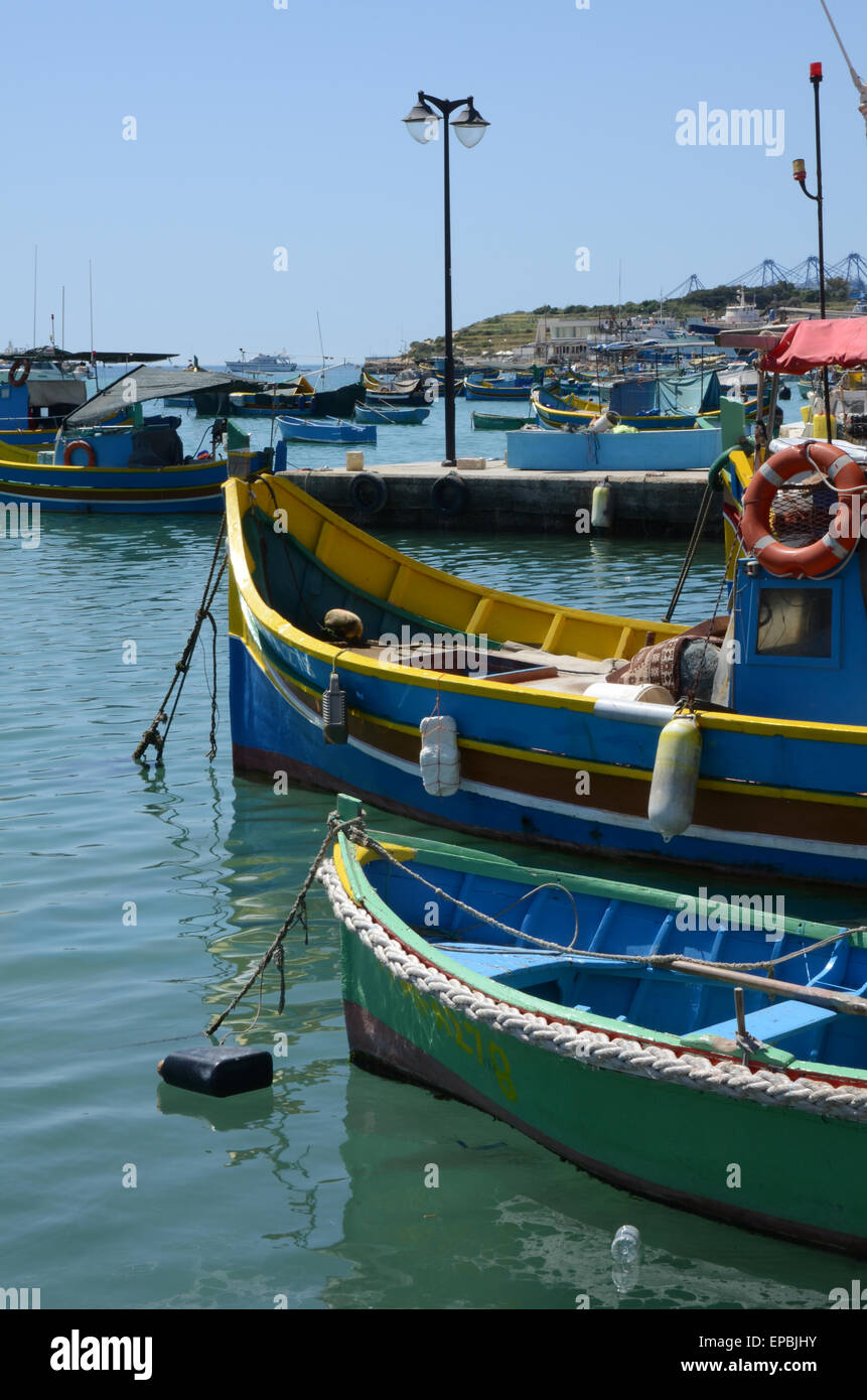 Traditional Maltese luzzu in Marsaxlokk harbour Stock Photo - Alamy