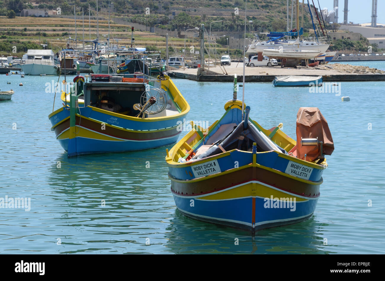 Traditional Maltese luzzu in Marsaxlokk harbour Stock Photo - Alamy