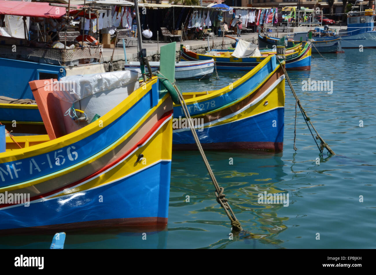 Traditional Maltese luzzu in Marsaxlokk harbour Stock Photo - Alamy