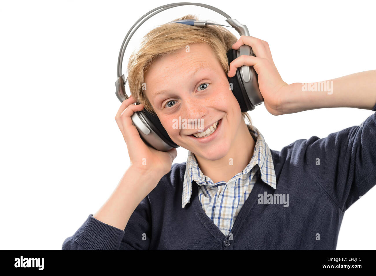 Happy boy listening to music Stock Photo - Alamy