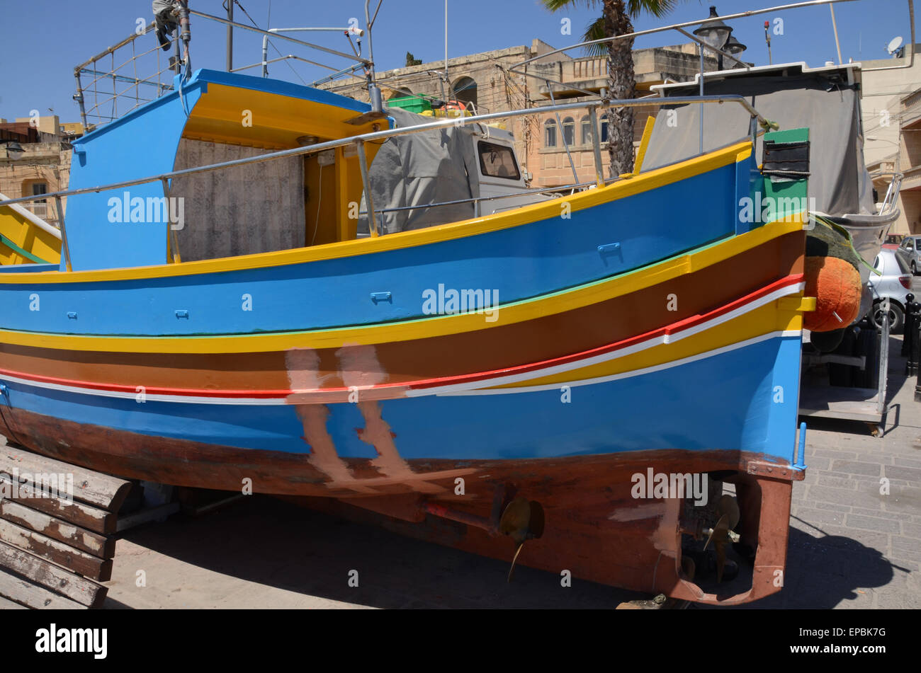 Traditional Maltese luzzu in Marsaxlokk harbour Stock Photo - Alamy