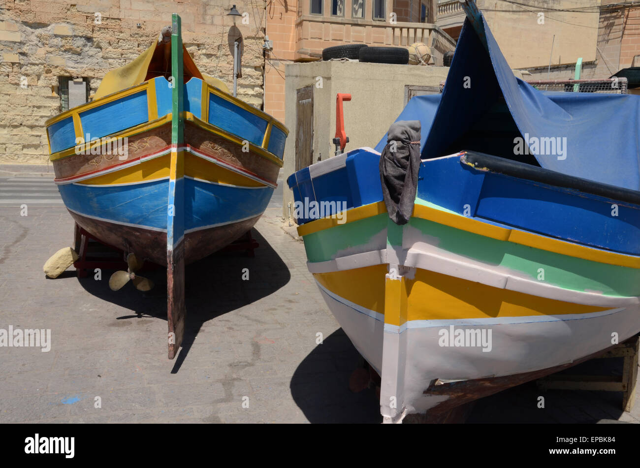 Traditional Maltese luzzu in Marsaxlokk harbour Stock Photo - Alamy