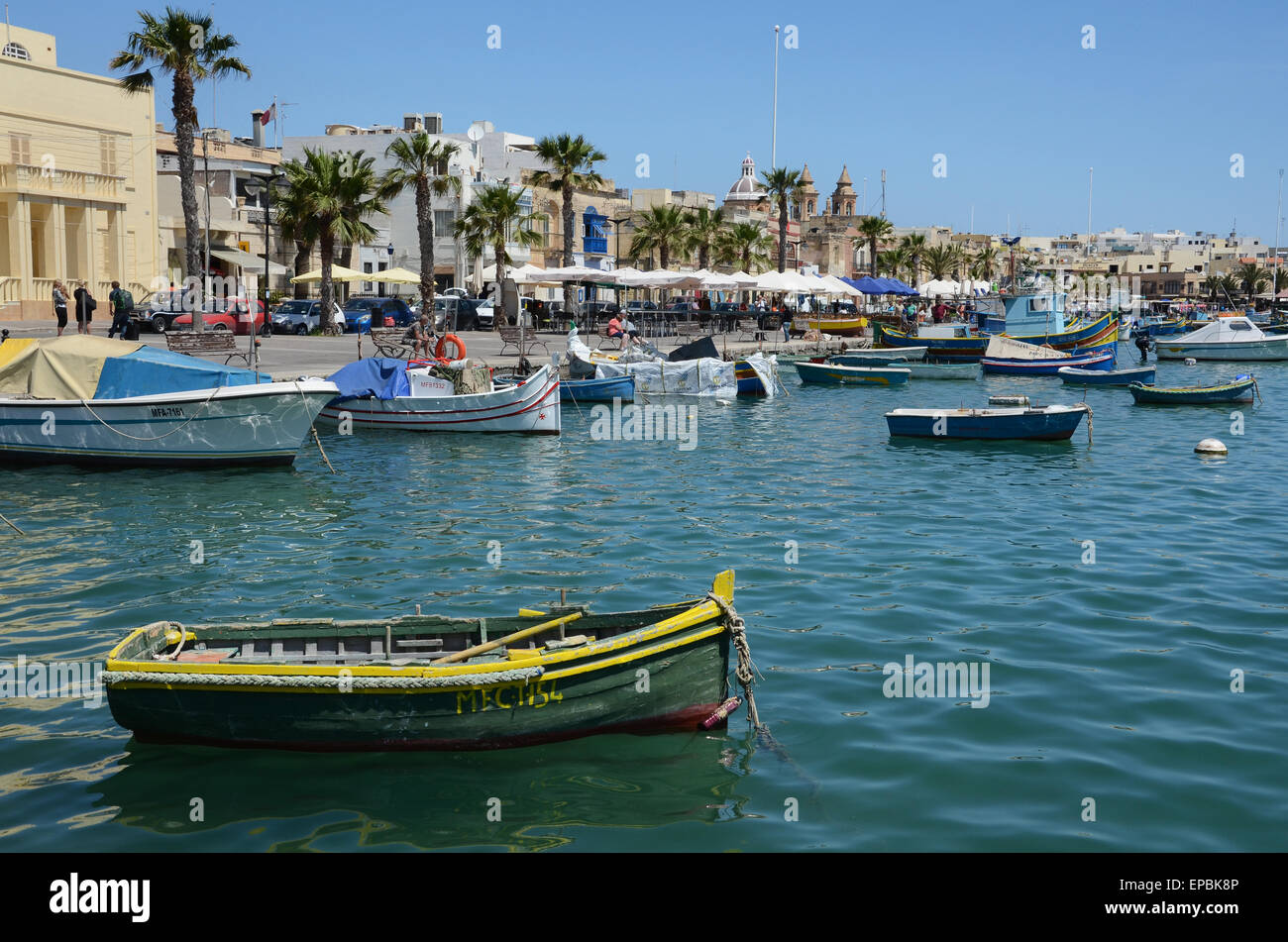 Traditional Maltese luzzu in Marsaxlokk harbour Stock Photo - Alamy