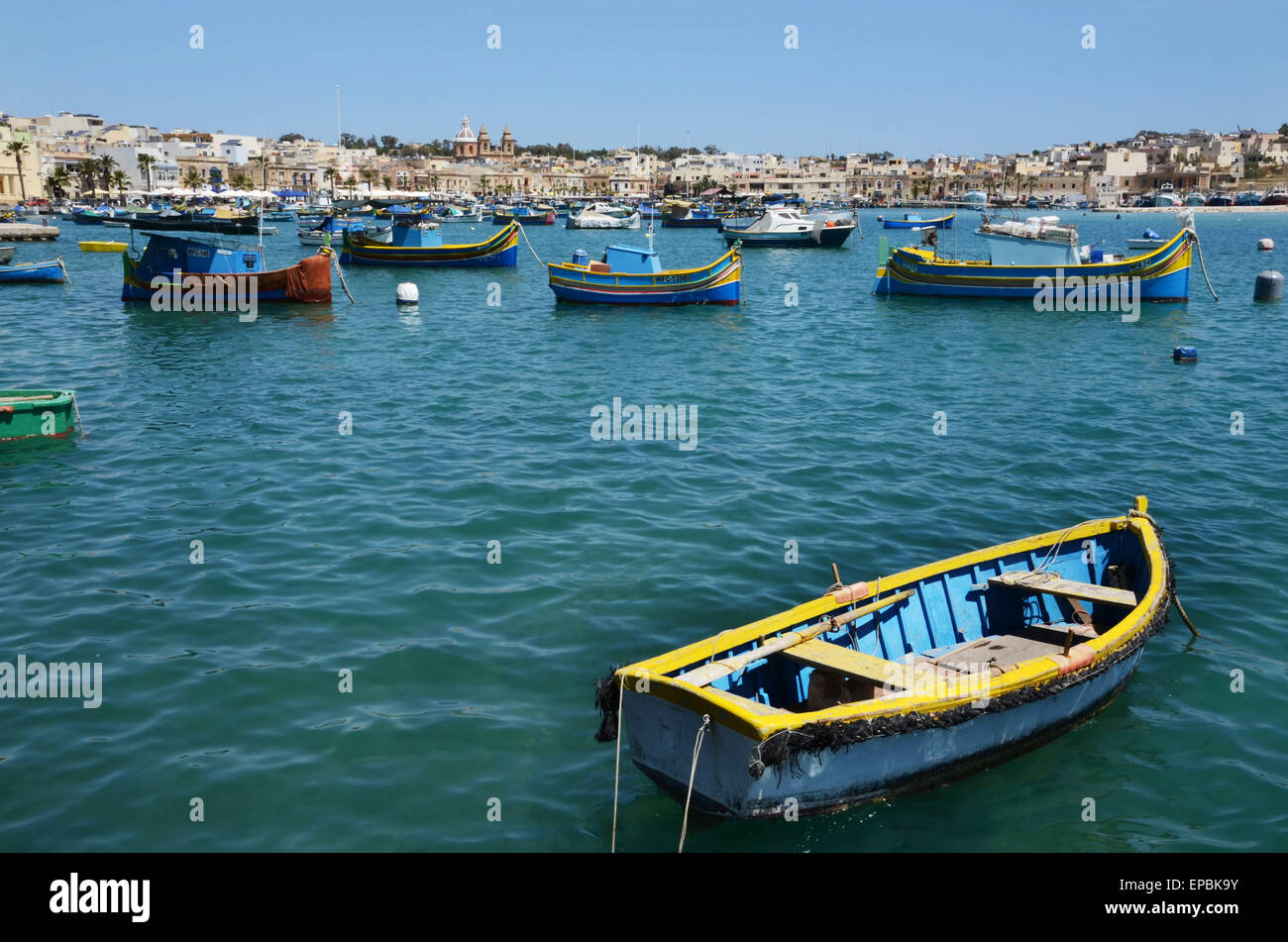Traditional Maltese luzzu in Marsaxlokk harbour Stock Photo - Alamy